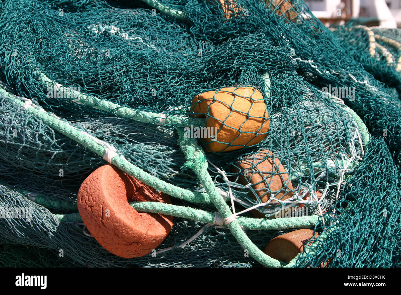 Orange fish net float hi-res stock photography and images - Alamy