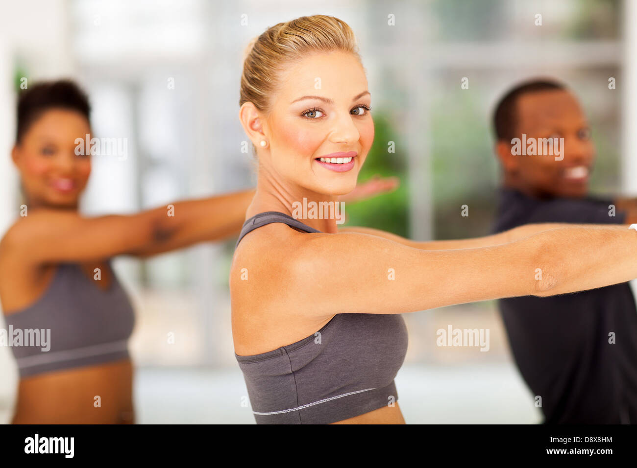 smiling group of fit people working out Stock Photo - Alamy