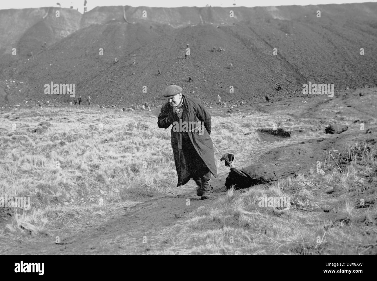 Dragging sack Black and White Stock Photos & Images - Alamy