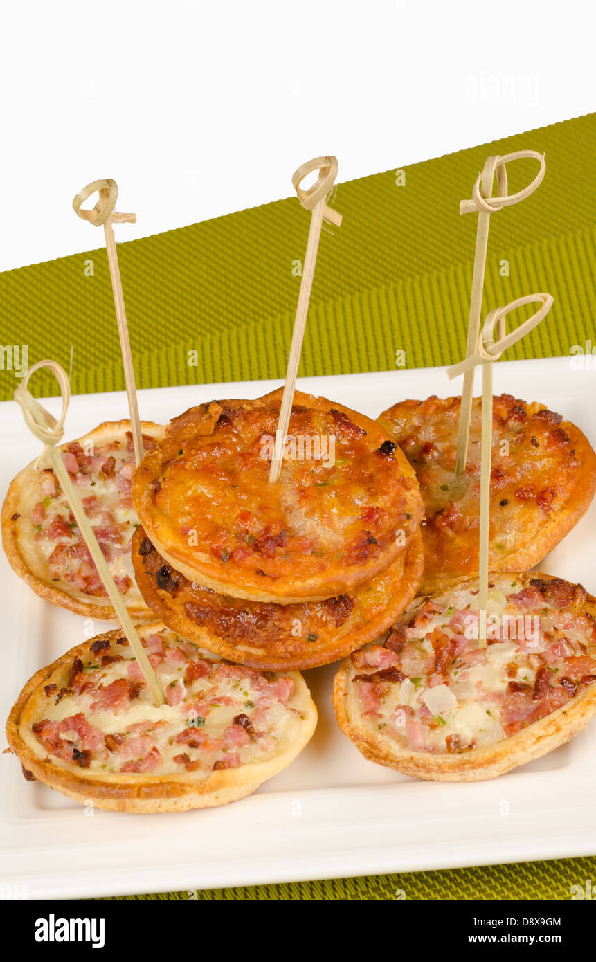 Portion of an assortment of small pizzas Stock Photo - Alamy