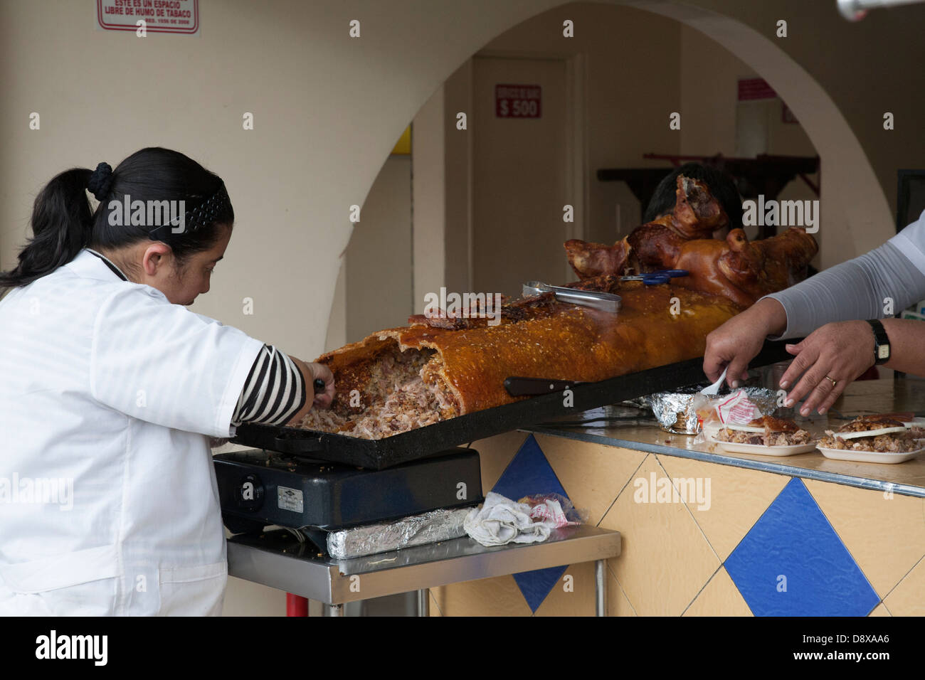 Lechona, stuffed pig with rice and meat, Bogota, Colombia Stock Photo ...