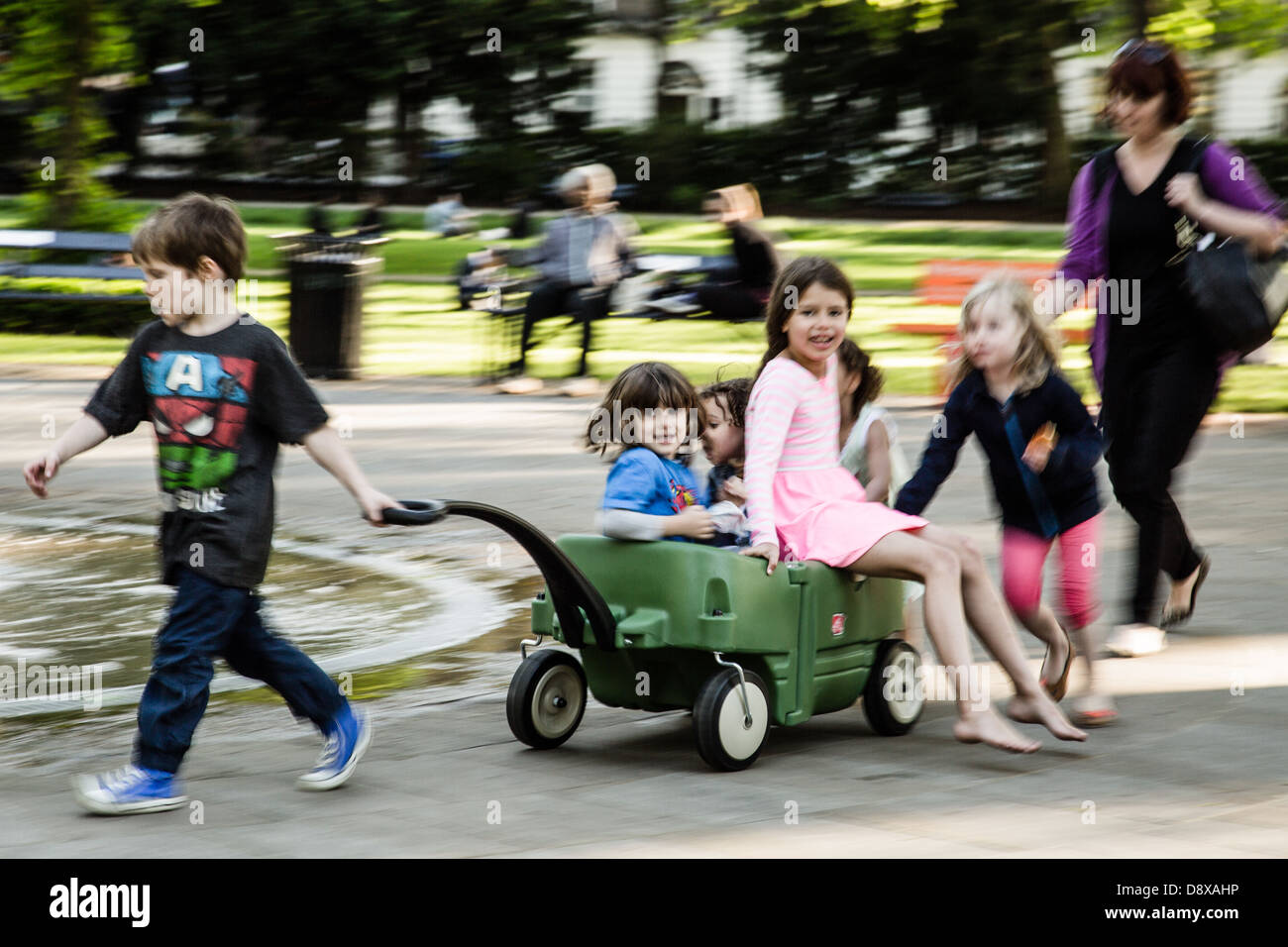 children playing in park Stock Photo - Alamy