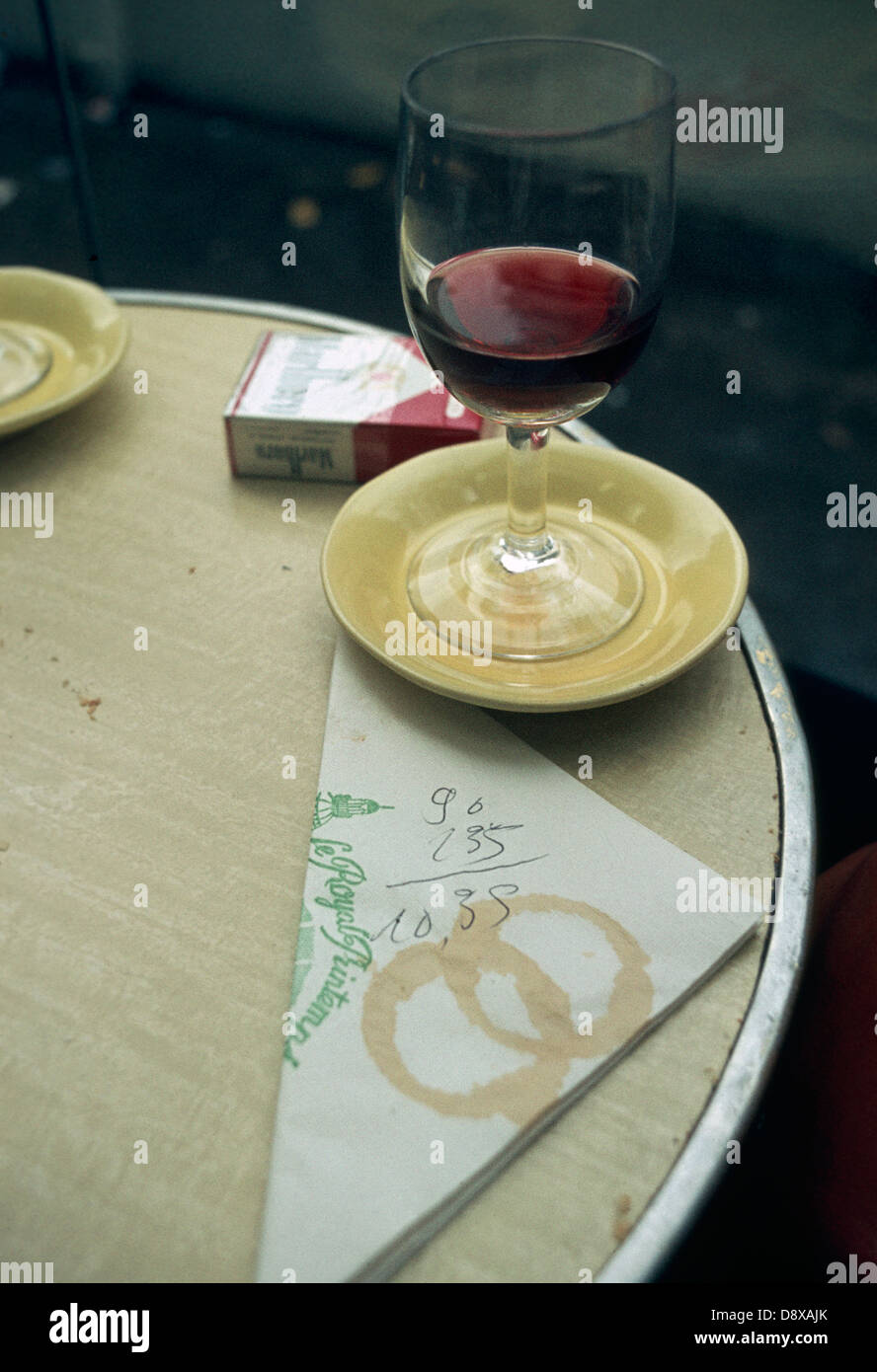 A glass of red wine on a table Stock Photo - Alamy