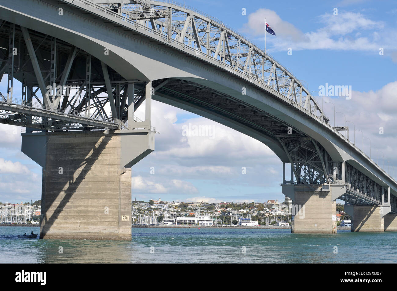 Steel and concrete motorway harbour crossing bridge on calm sunny day ...