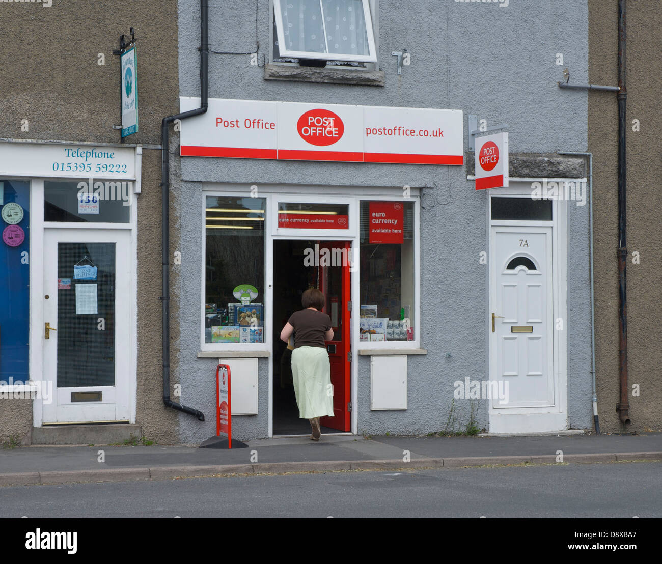 Woman post office hi-res stock photography and images - Alamy