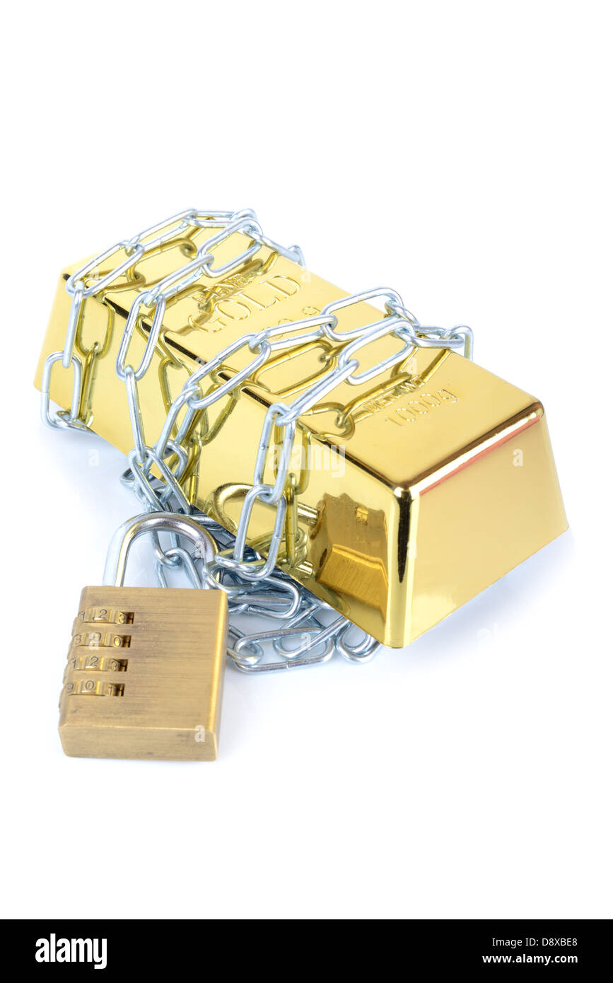 Gold bullion bar ingot chained up with padlock concept of secured money ...