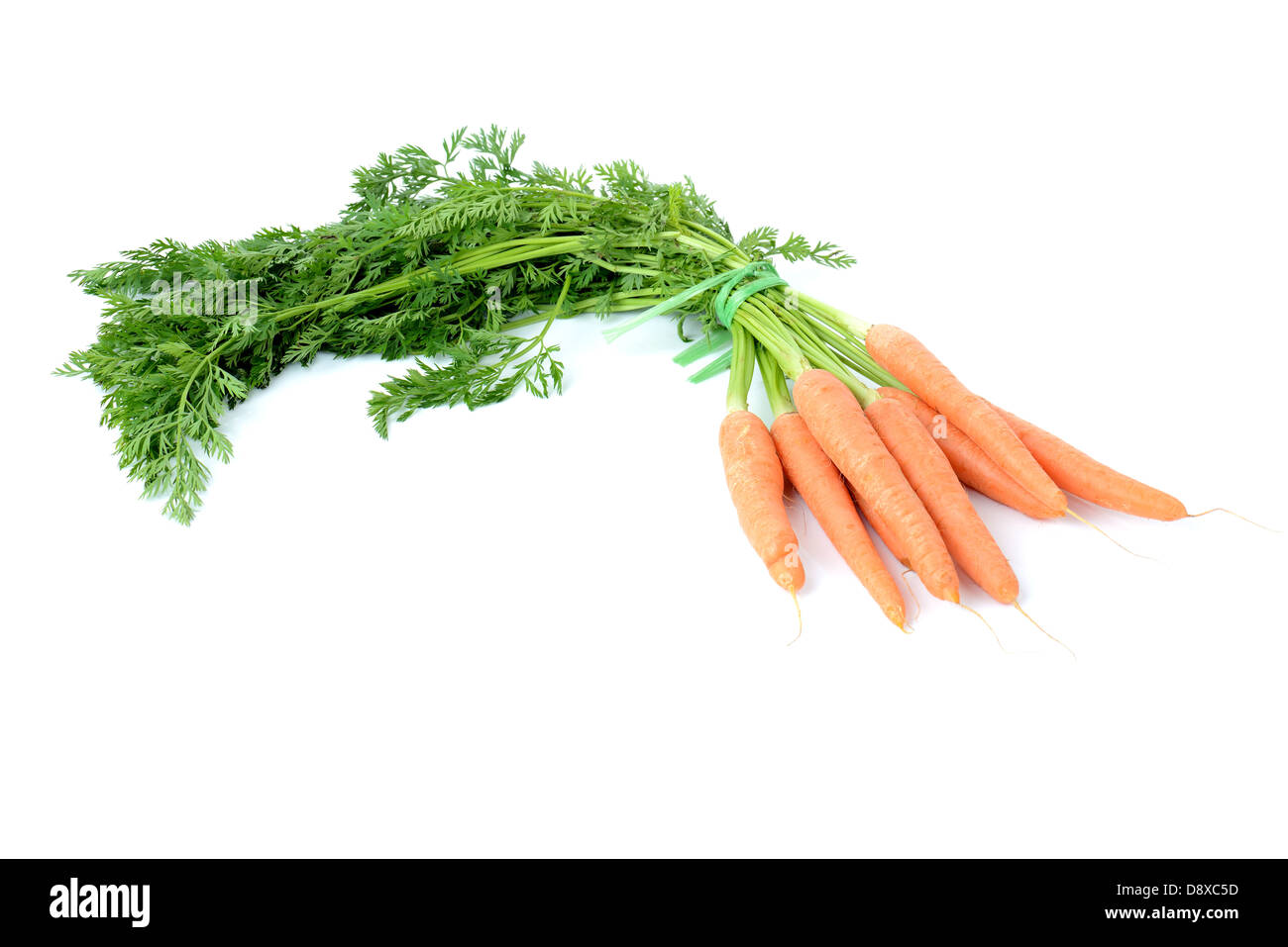 a fresh bunch of carrots isolated on white Stock Photo - Alamy