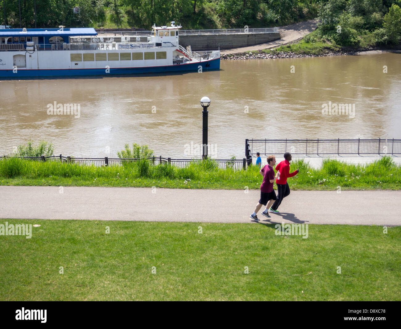 people running by the river in Edmonton Stock Photo - Alamy