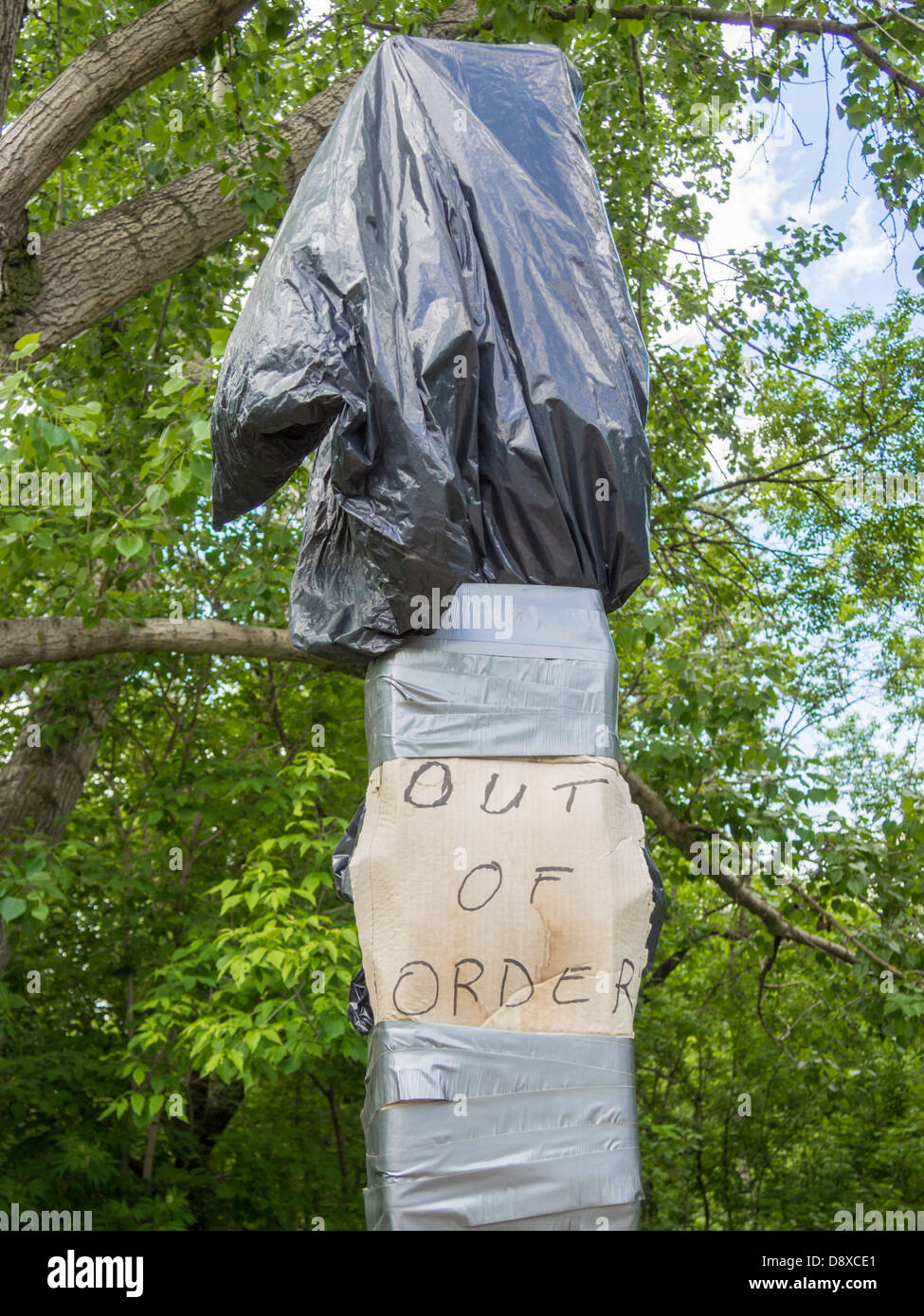 security camera with out of order sign and garbage bag over it Stock ...