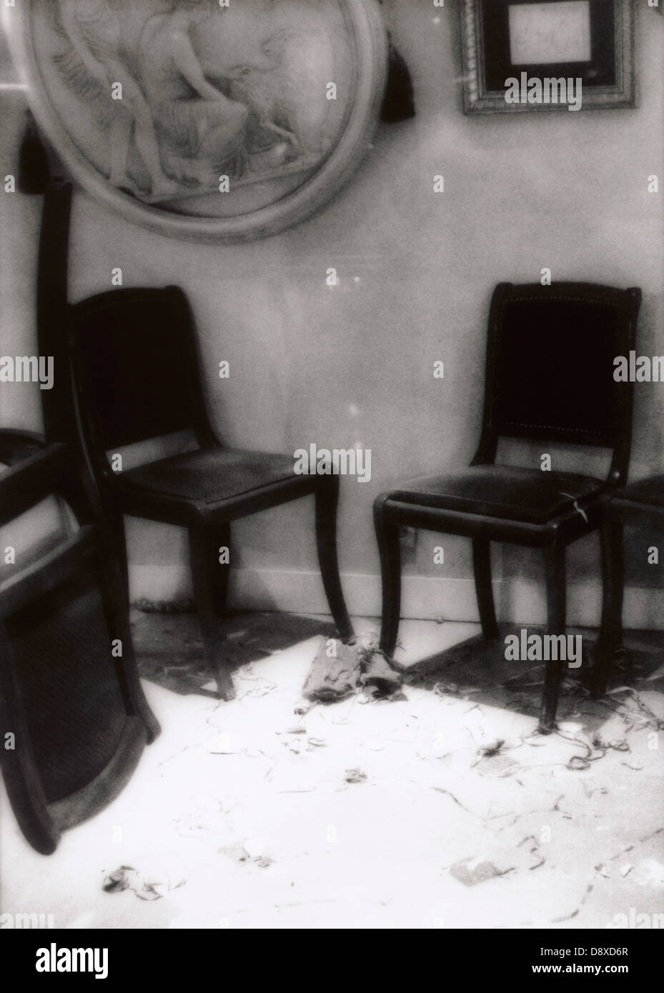 Chairs in messy room Stock Photo - Alamy