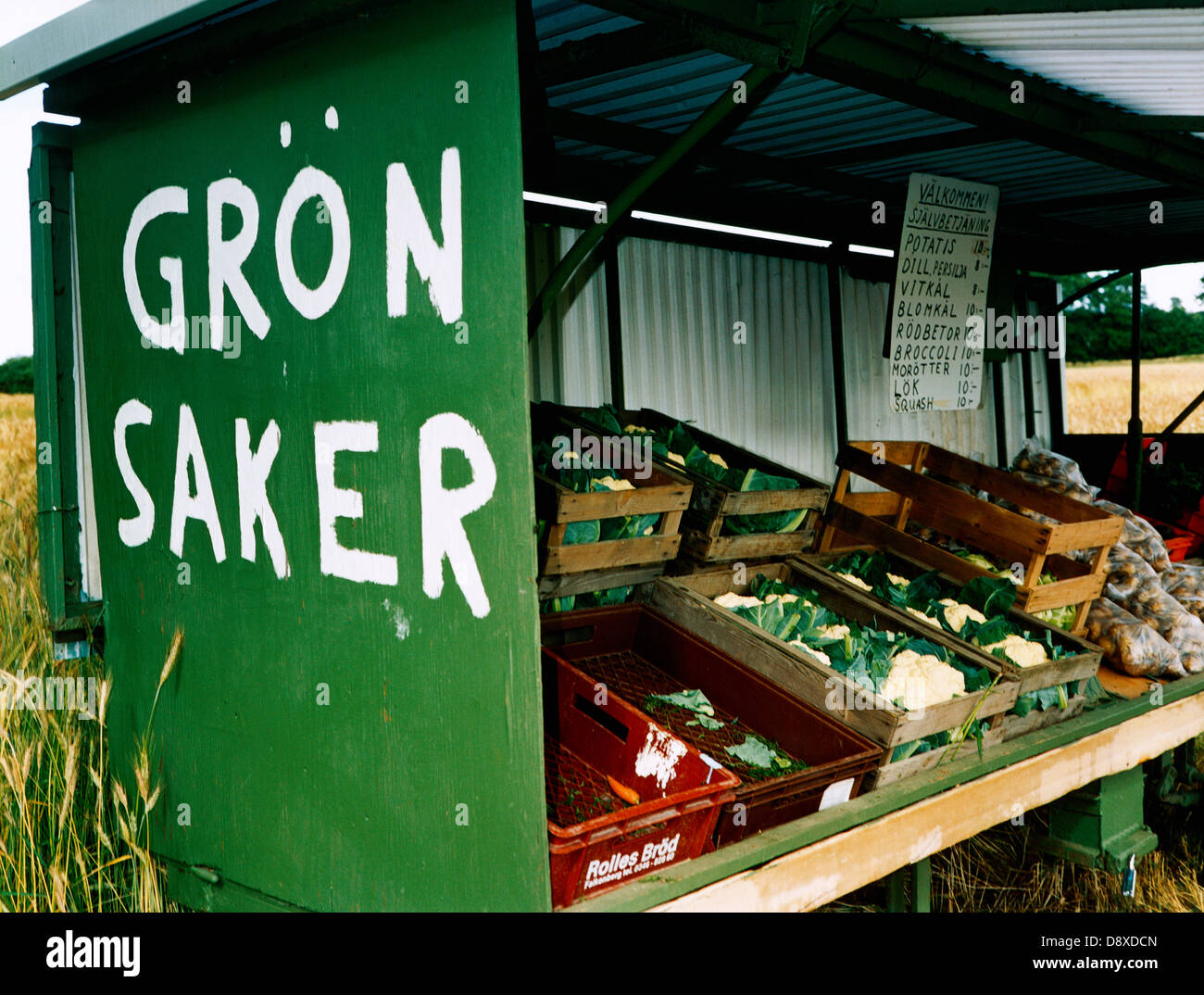 Baskets of vegetable in market stall Stock Photo - Alamy