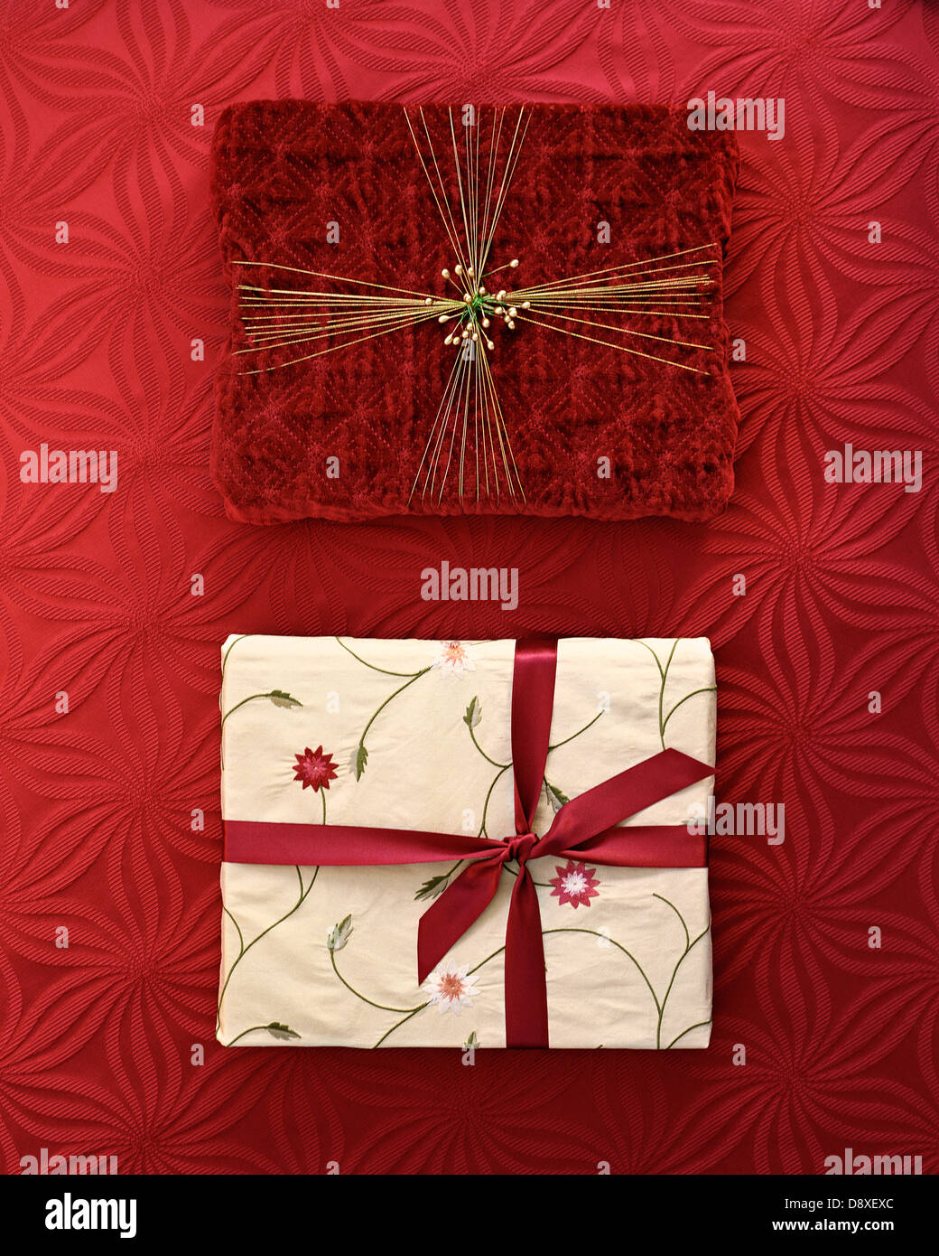 Christmas Presents against a Red Background Stock Photo - Alamy
