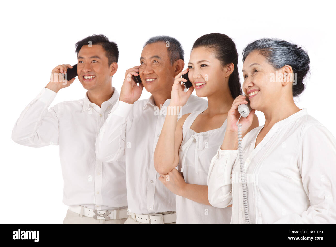 Young couple and old couple making phone call Stock Photo - Alamy