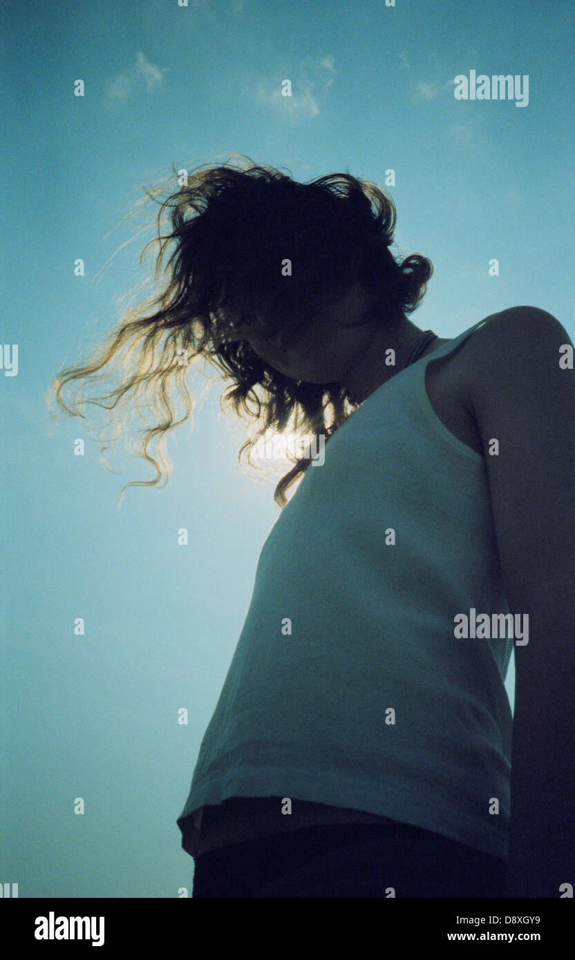 A young woman against the light Stock Photo - Alamy