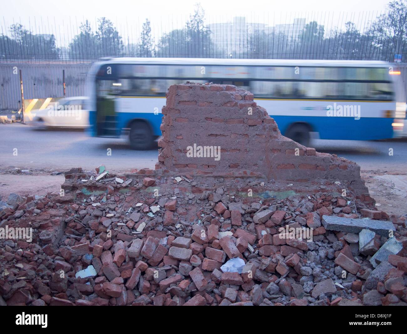 Feb 10, 2013 - Yelahanka, Karnataka, India - Men walking next to a ...