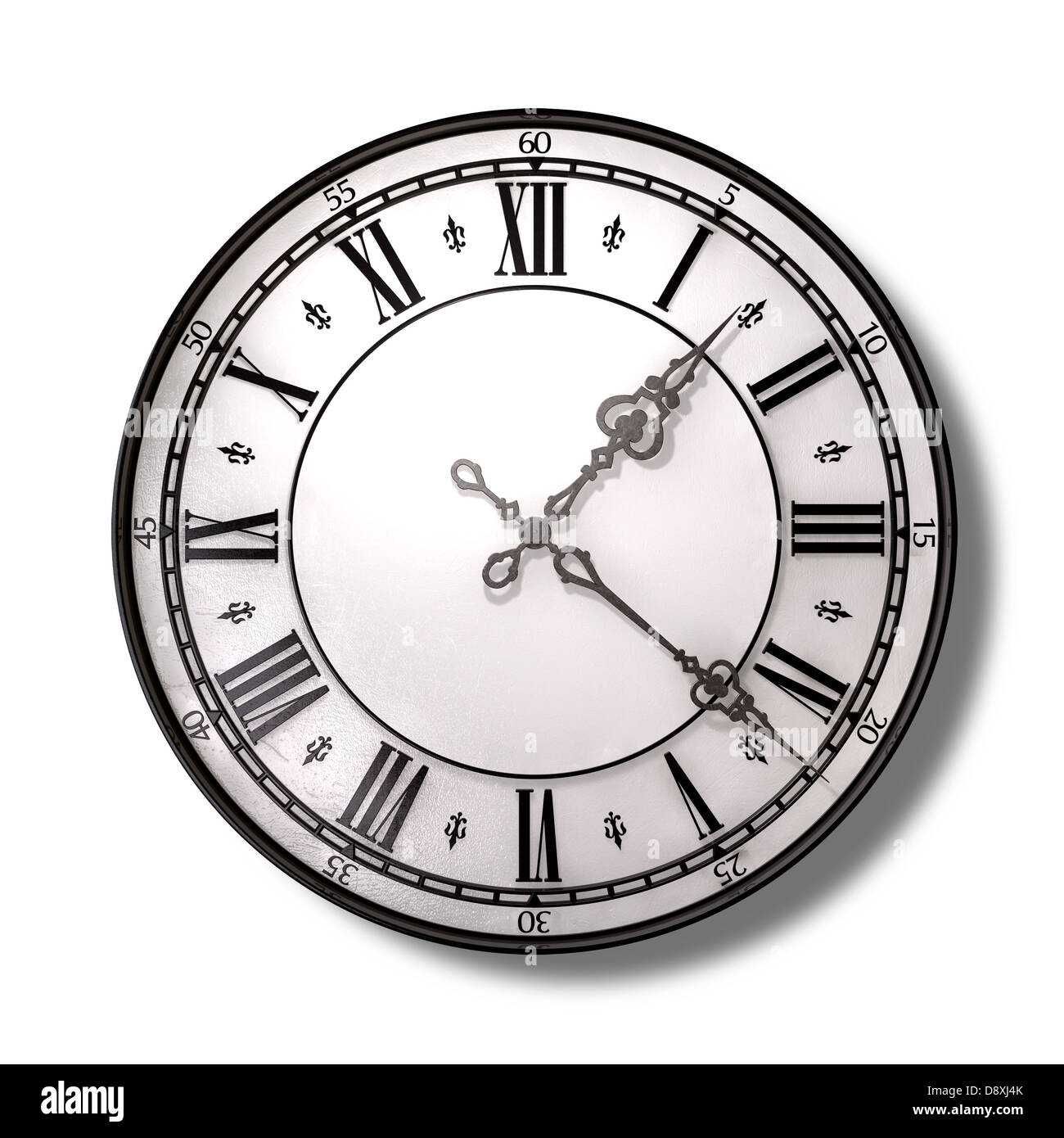 An antique clock with roman numerals and ornate metal hands on an ...