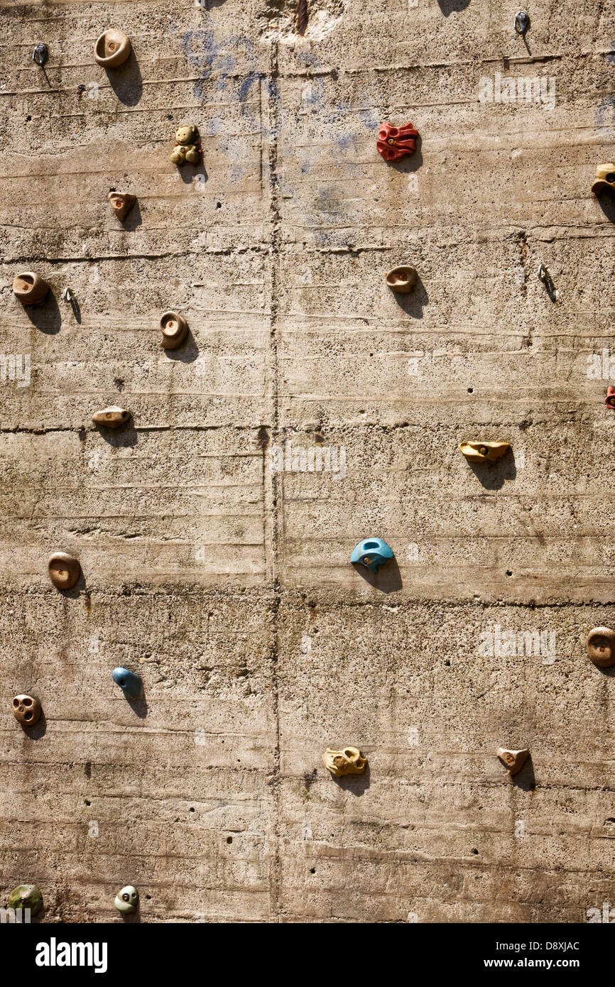 Background surface of rock climbing wall with holds Stock Photo - Alamy