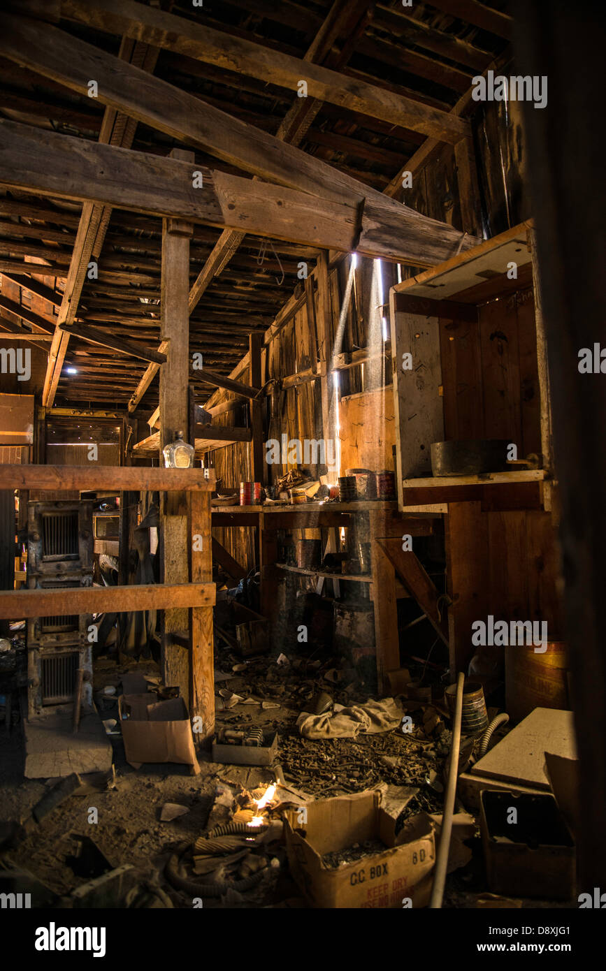 Sunlight creeping through the boards of a hoist house at a historic ...
