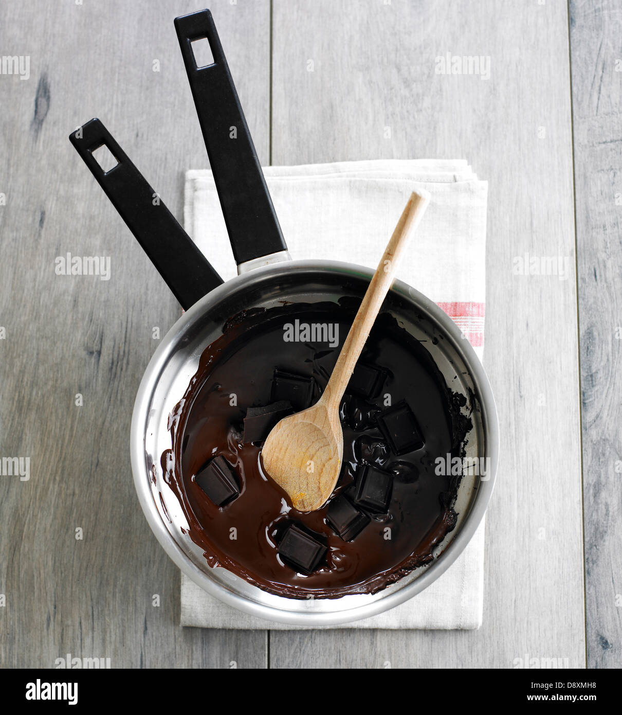Melting the chocolate in a bain-marie Stock Photo - Alamy