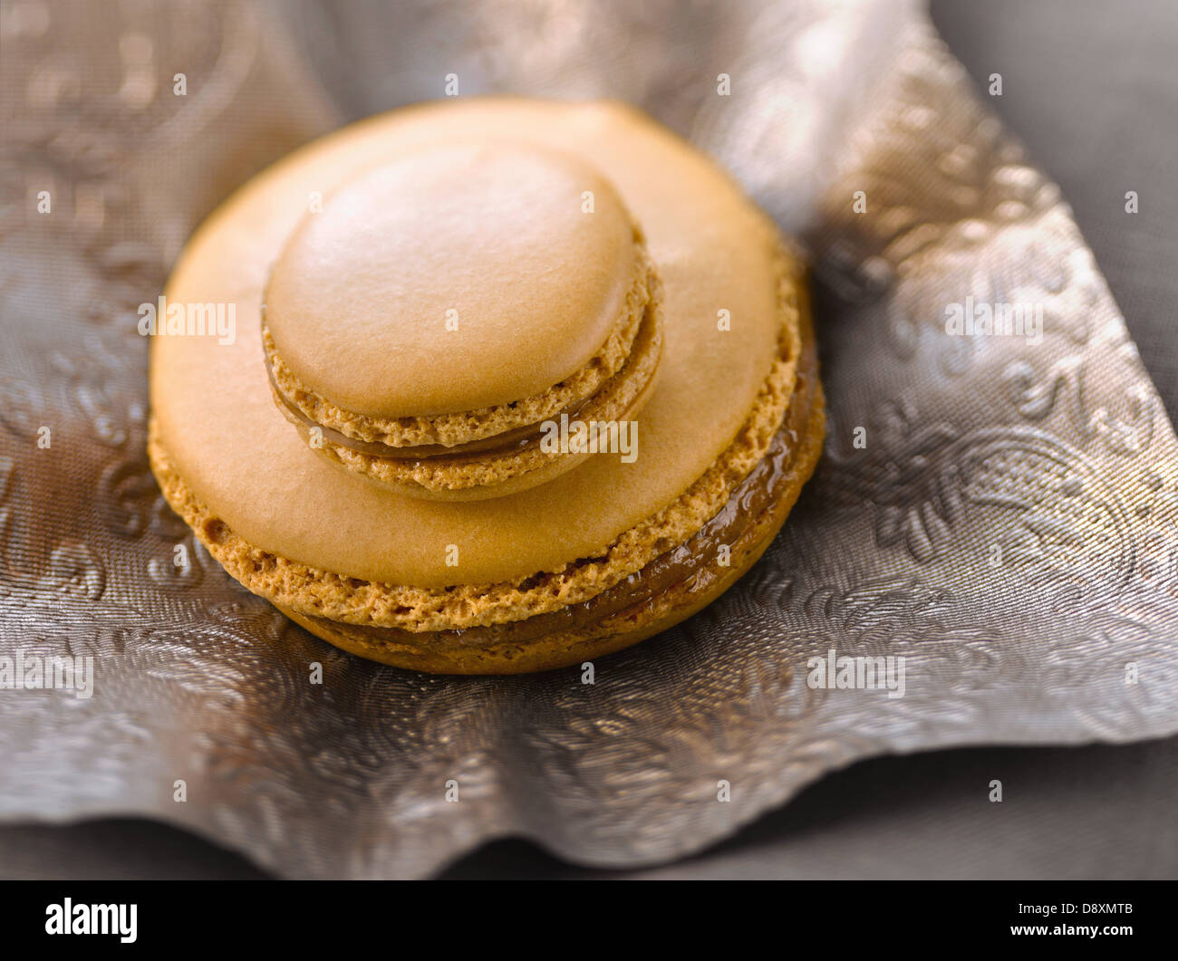 Big and small coffee macaroons Stock Photo - Alamy