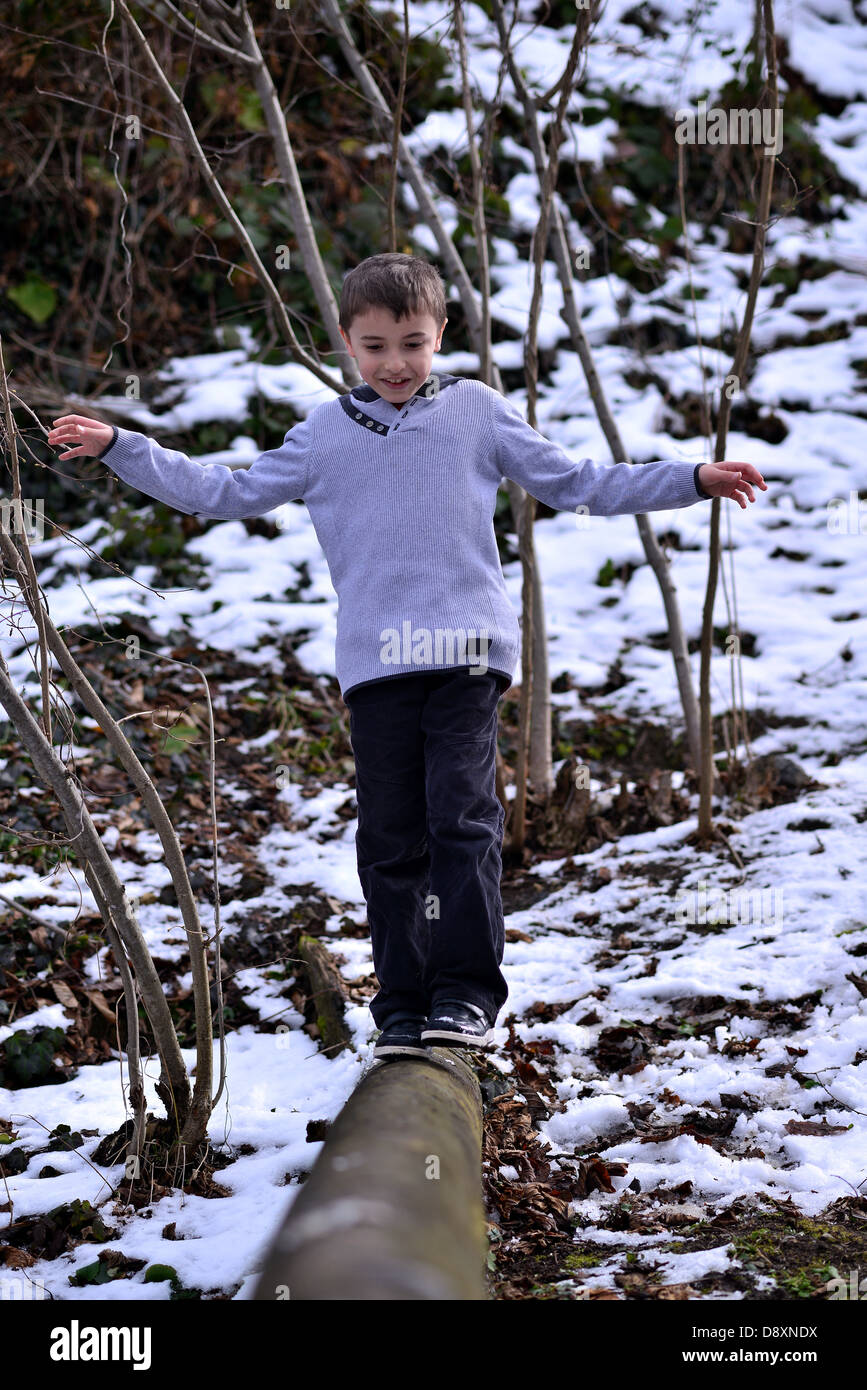 Boy walking in woods hi-res stock photography and images - Alamy