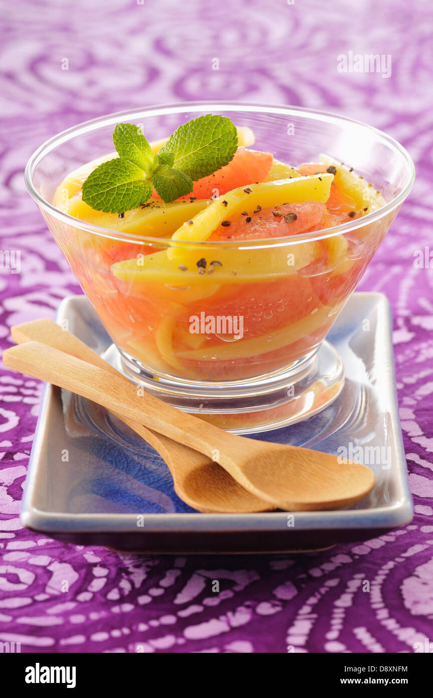 Four-flavored pink grapefruit and mango salad Stock Photo - Alamy