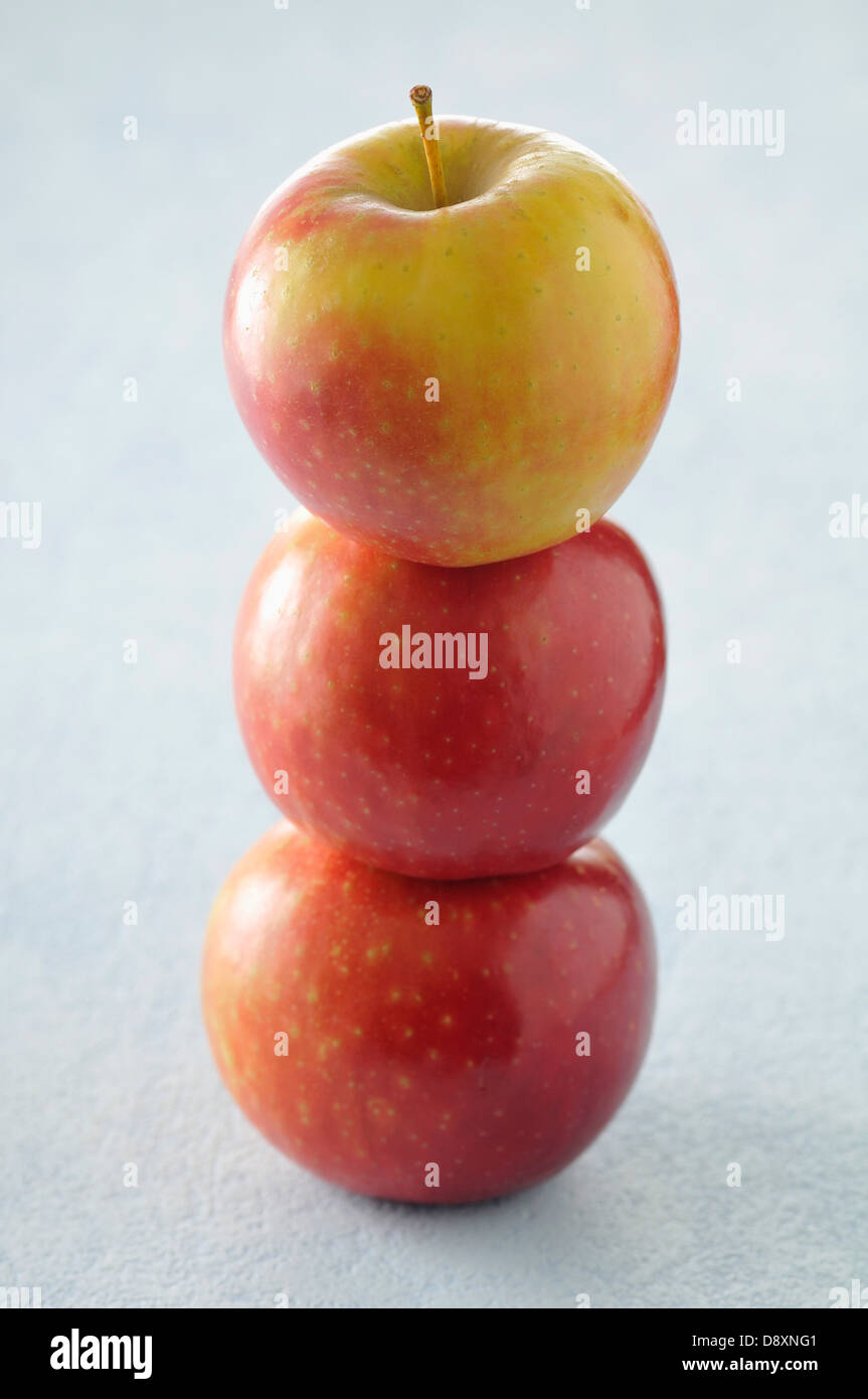 Three stacked apples Stock Photo - Alamy