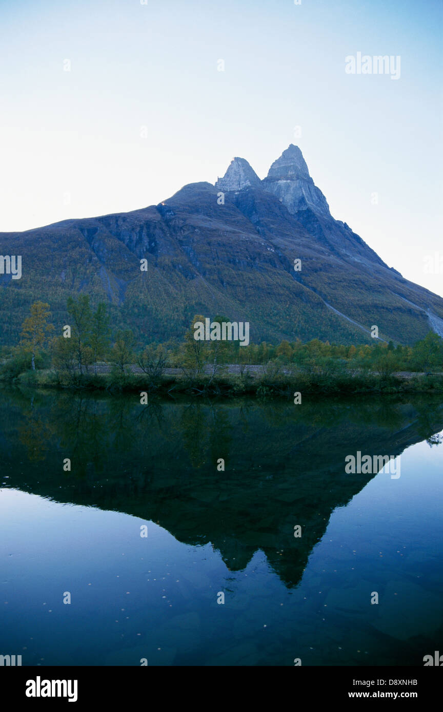 Reflection of mountain on surface of water Stock Photo - Alamy