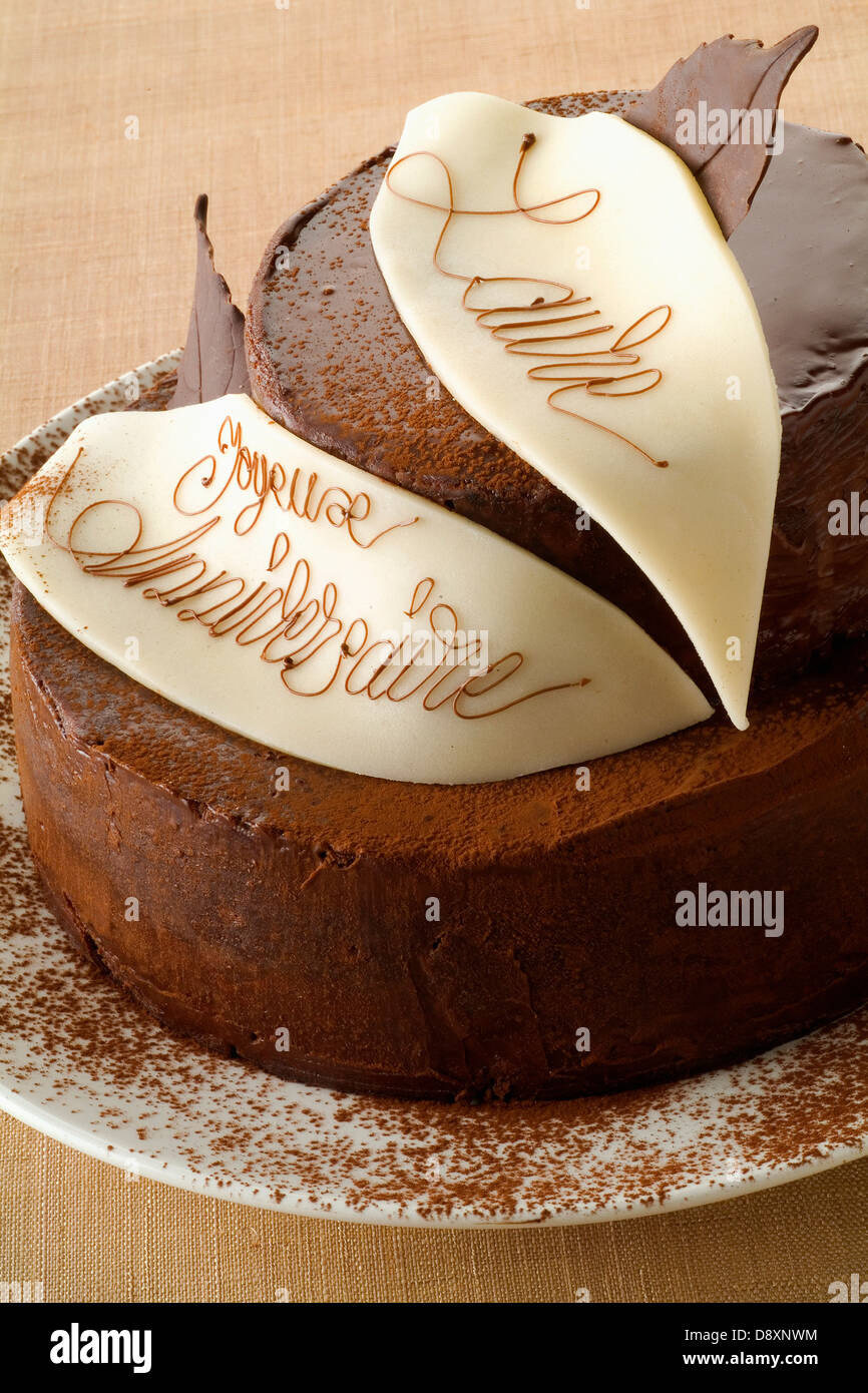 Cake with Nutella inscriptions Stock Photo - Alamy