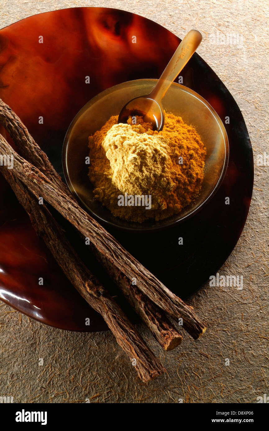 Licorice sticks and ground licorice Stock Photo - Alamy