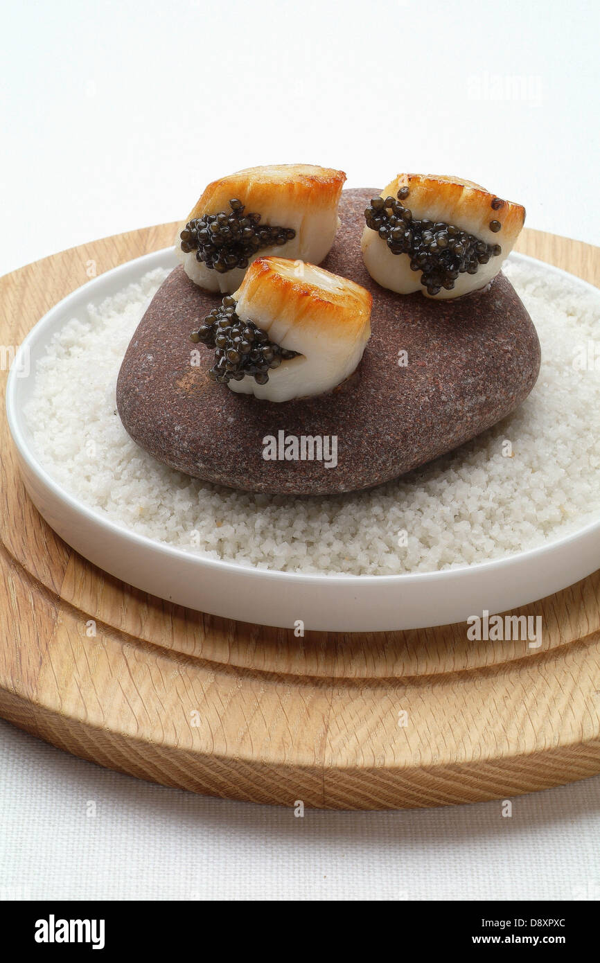 Scallops with caviar Stock Photo - Alamy