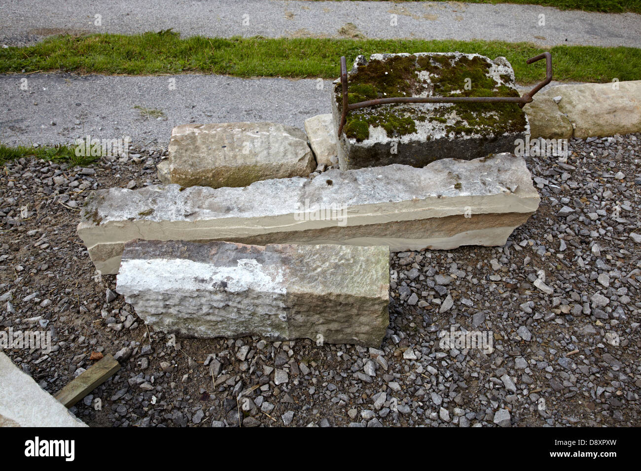 Broken stone lintel for new barn window Stock Photo - Alamy