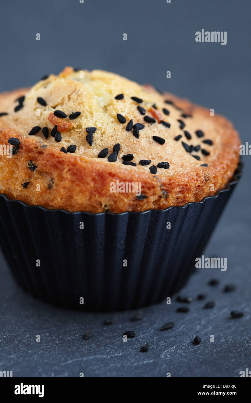 Black sesame seed muffin in a silicone mould Stock Photo - Alamy
