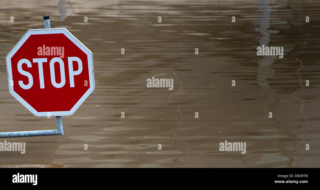 Dresden, Germany. 6th June 2013. A stop sign sticks out of the water in ...