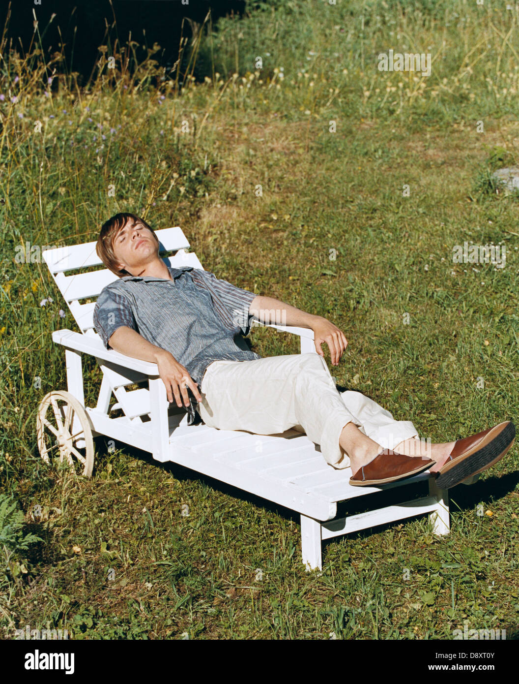 Person sun bathing summer garden hi-res stock photography and images ...