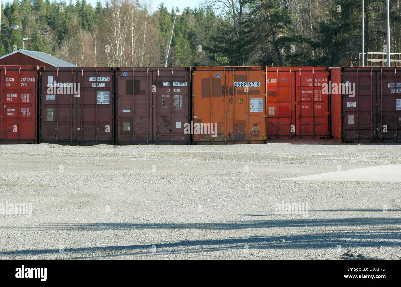 Cargo Containers in a Row Stock Photo - Alamy