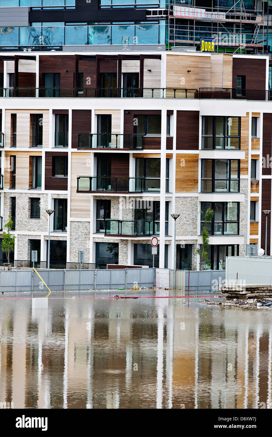 Brand new luxury Dock Residence in Prague Liben reflects in flood water ...