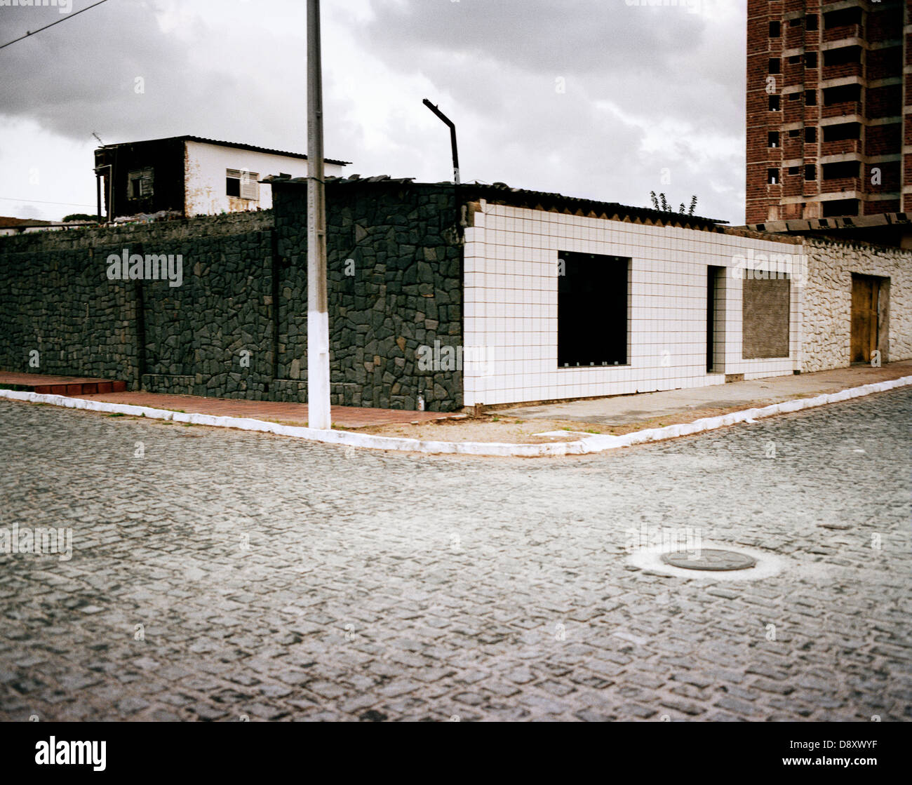 Pavement by building Stock Photo - Alamy