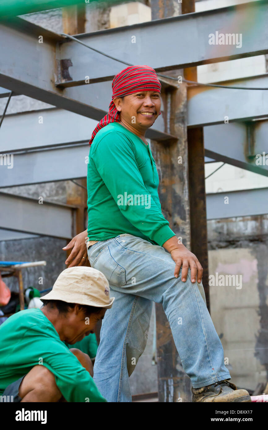 Construction Workers in the Streets of Manila, Philippines Stock Photo ...