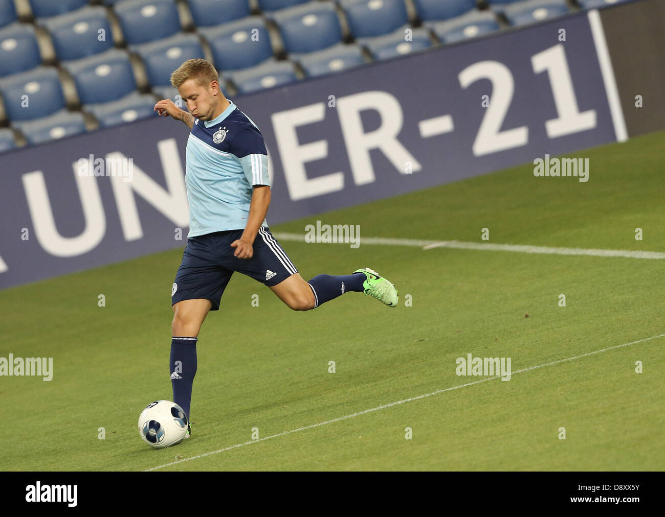 The Germany's Lewis Holtby runs with the ball during the final practice ...