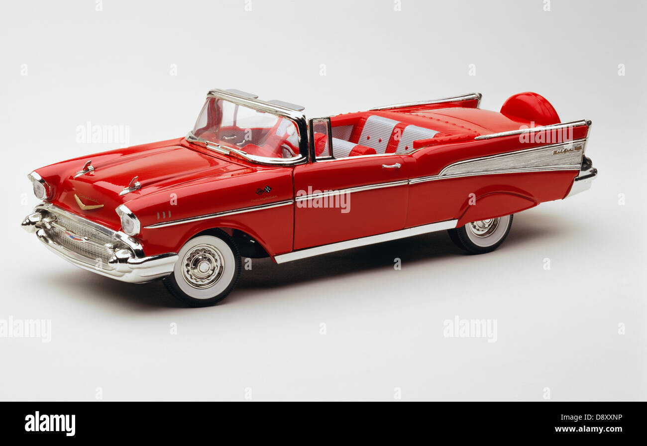Red toy convertible car against white background Stock Photo - Alamy