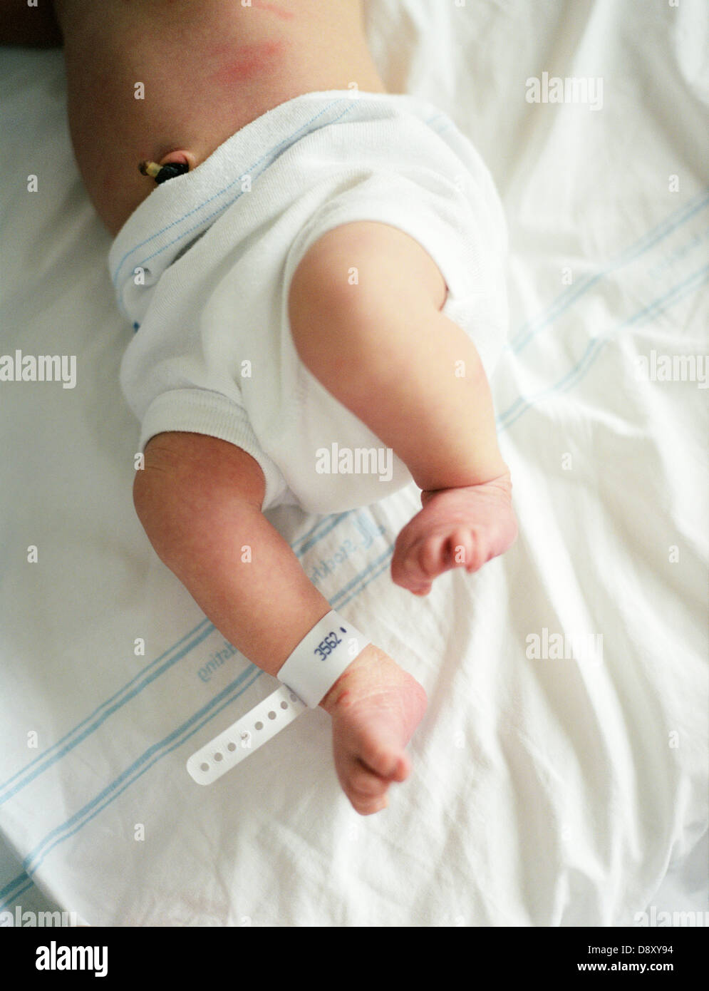 The legs of a newborn baby Stock Photo - Alamy