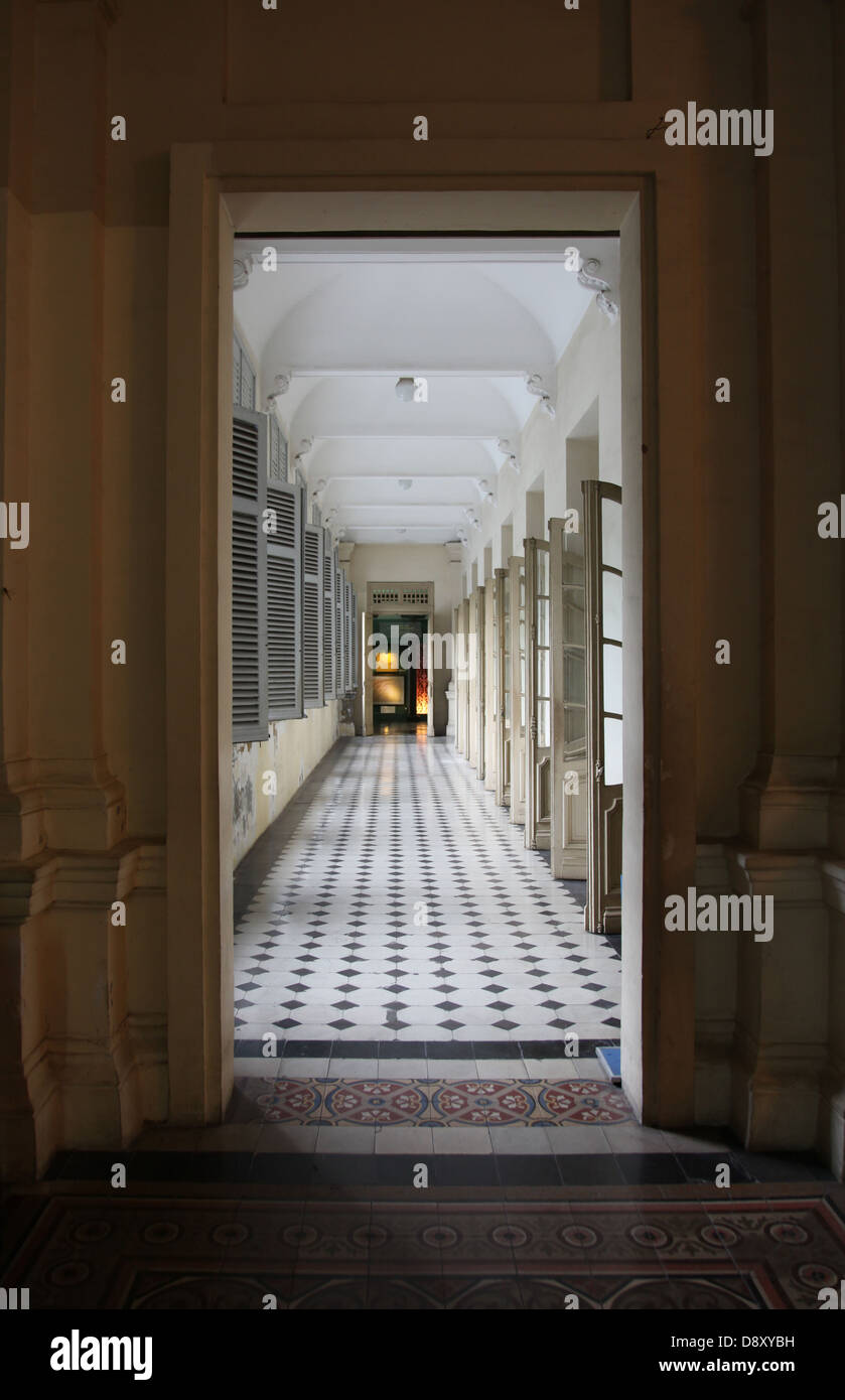 It's a photo of a corridor that is ending to a door or to a room. We ...