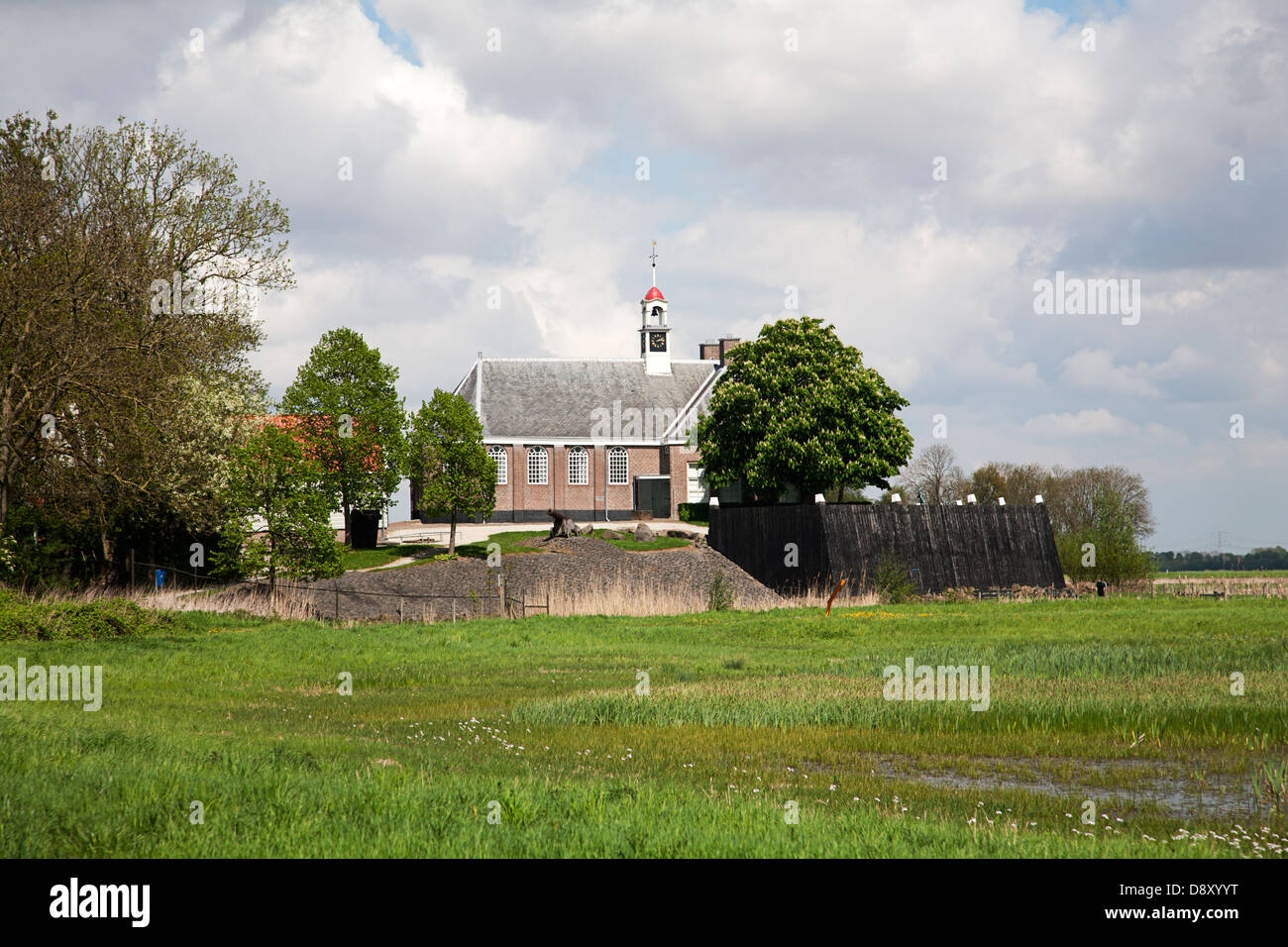 Terp Middelbuurt with historic church on Unesco World Heritage Site ...