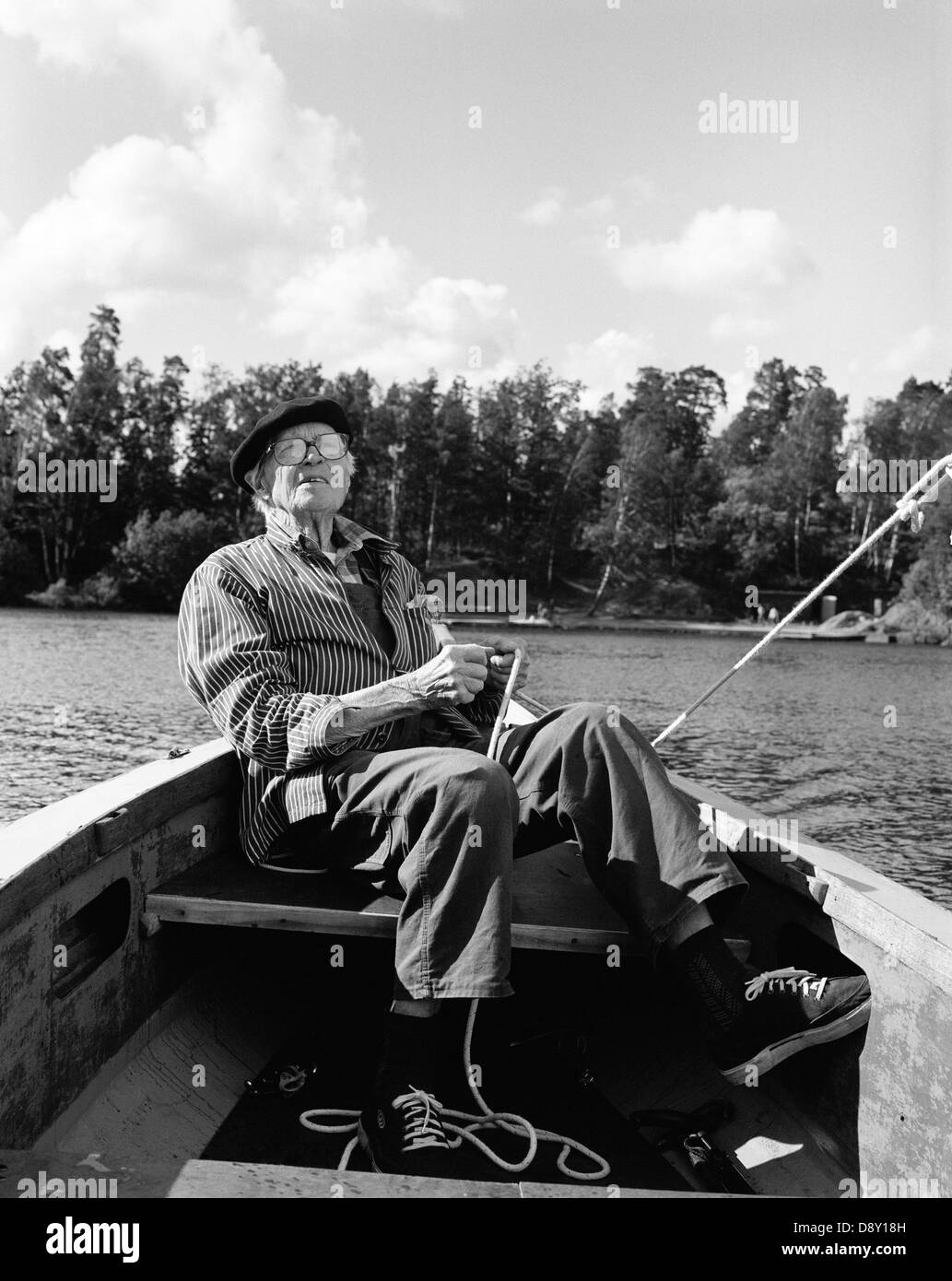 One person rowing boat Black and White Stock Photos & Images - Alamy