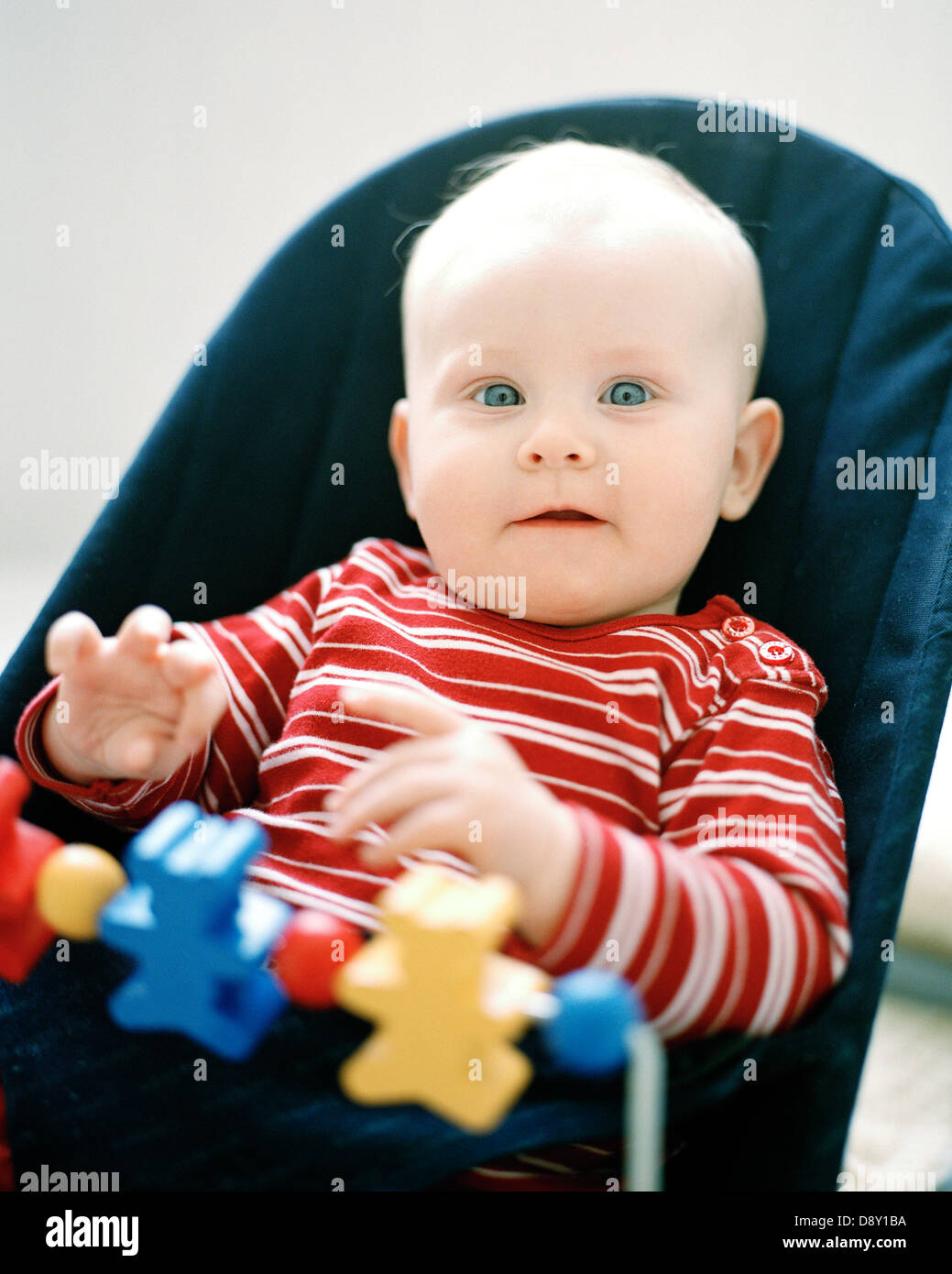 Baby in chair for babies hi-res stock photography and images - Alamy