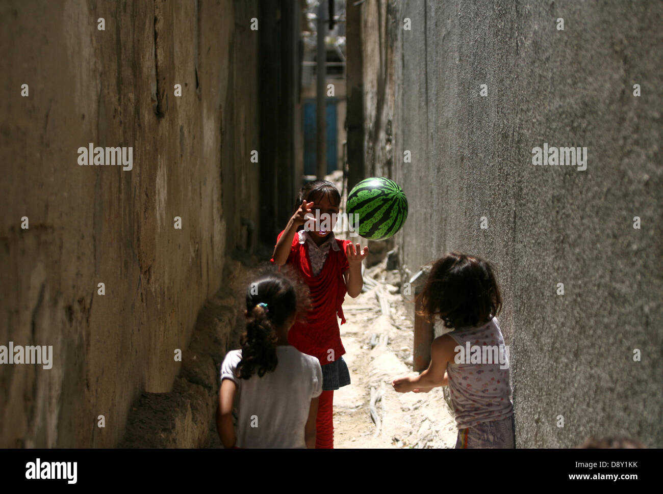 Palestinian children play football in hi-res stock photography and ...