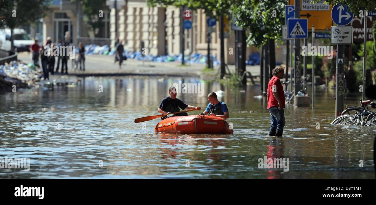Halle , Germany. 6th June, 2013. Firefighters patrol in dinghis on ...