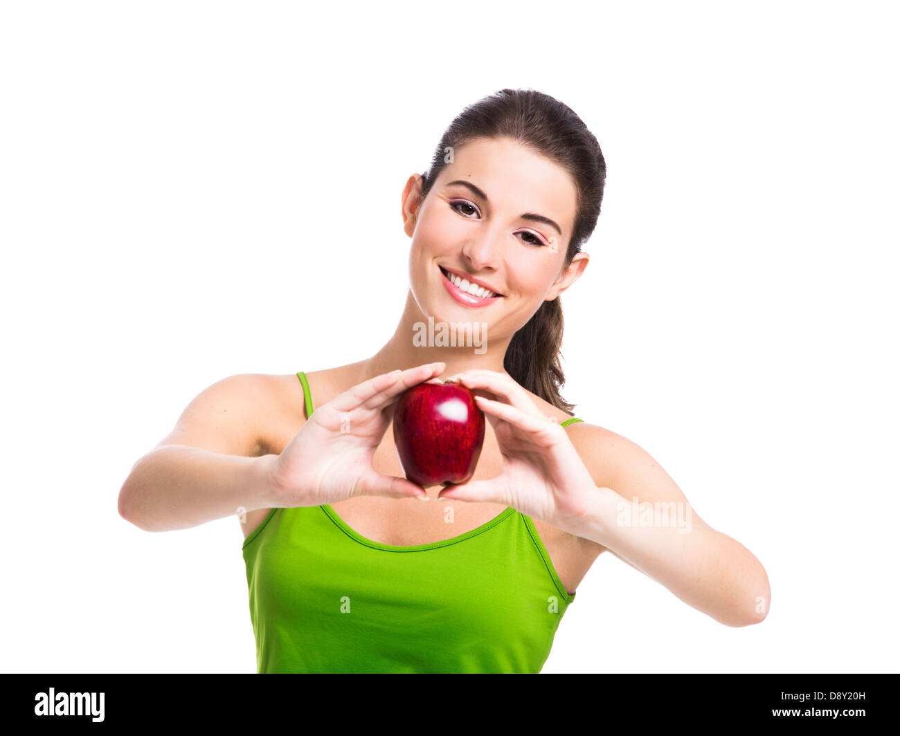 Healthy woman eating a fresh apple, isolated over a white background ...