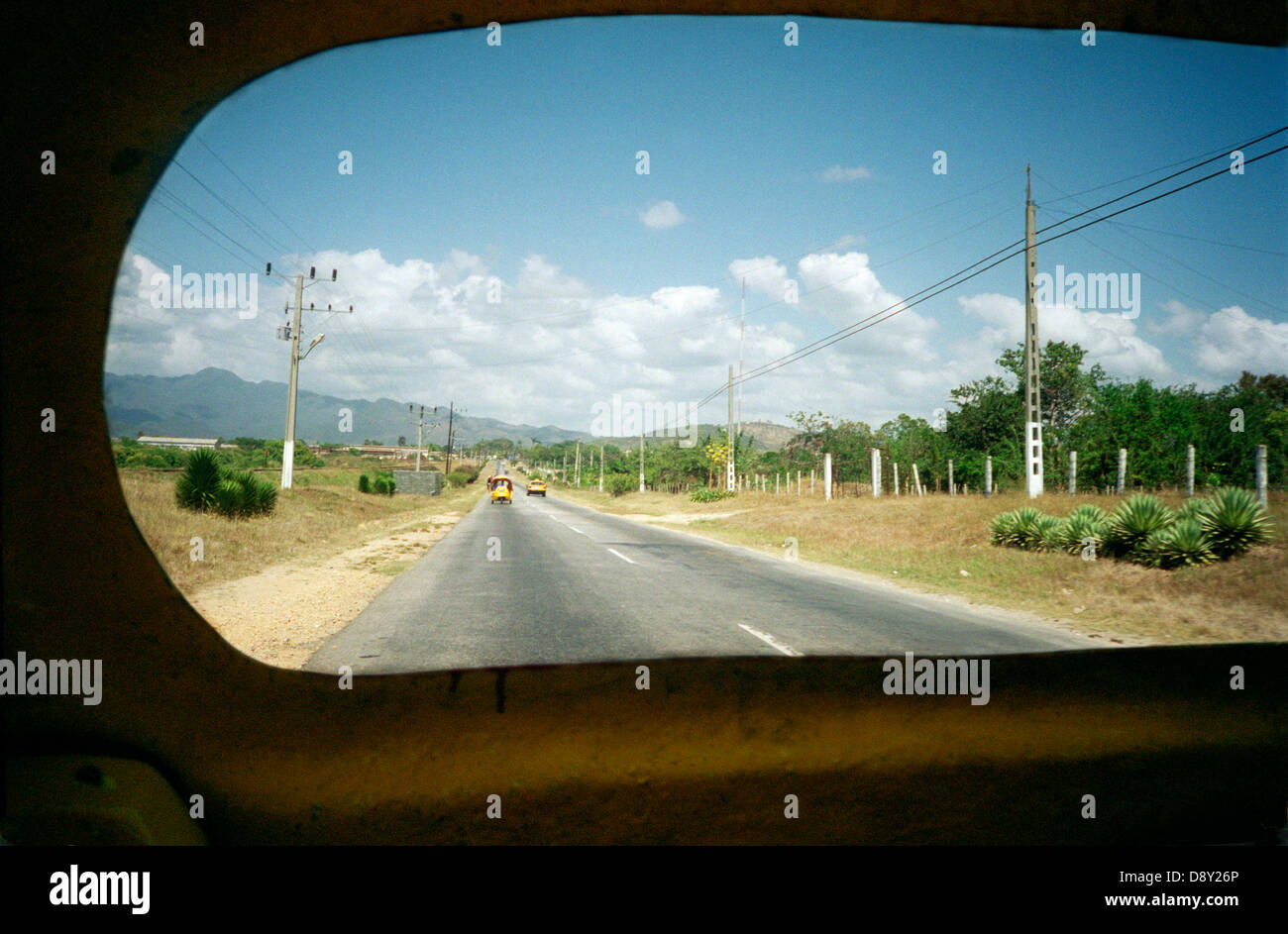 Country road seen through window of a vehicle Stock Photo - Alamy